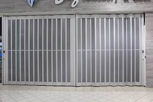 Sliding Grille Toronto. Storefront Security Gates - Sliders Inc.